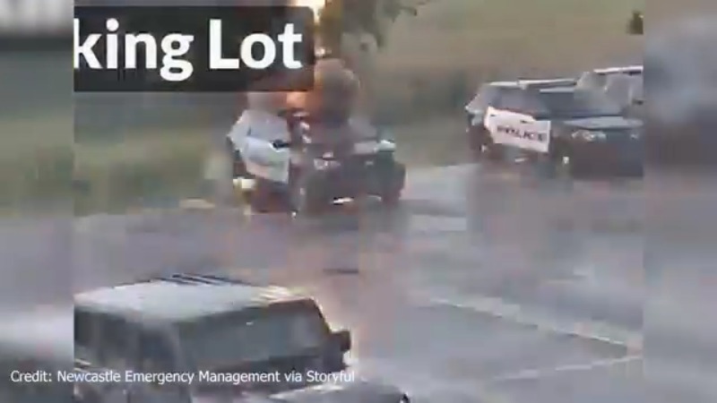 CAUGHT ON CAMERA: Patrol car struck by lightning during thunderstorm
