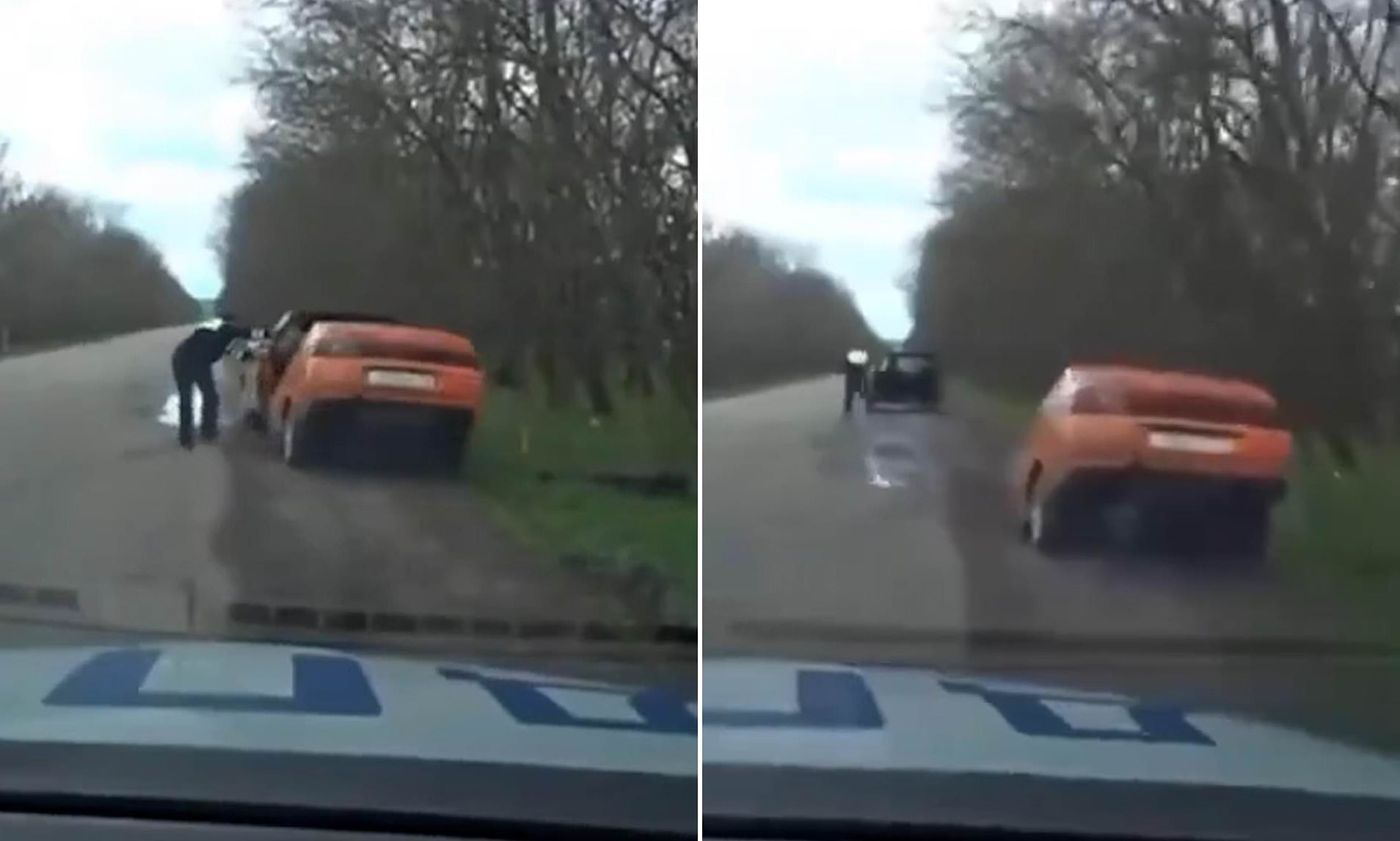 Motorist escapes after cop pulls him over... by splitting his car in ...