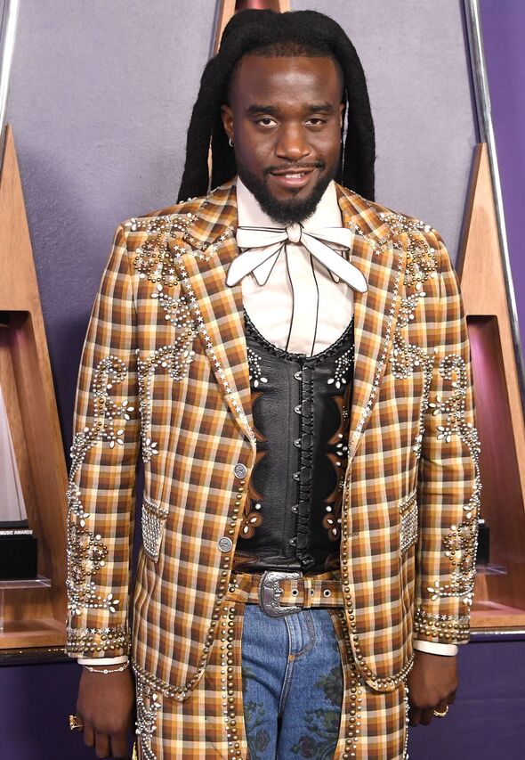 Shaboozey's unimpressed reaction to Megan Moroney at American Music ...