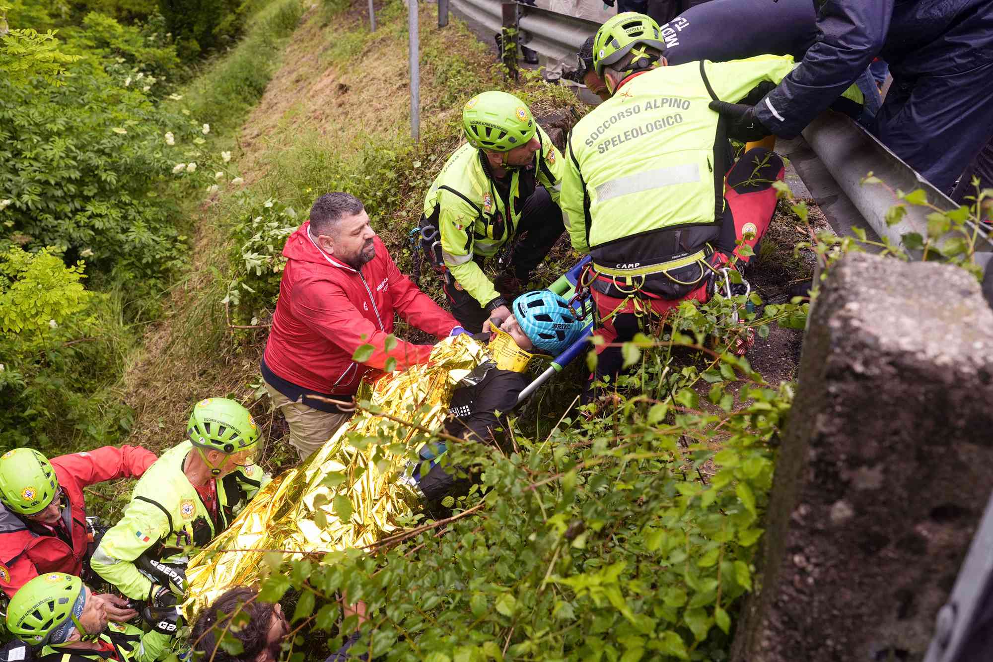 Pro Cyclist Crashes and Falls Down 50-Foot Hill During Race in ...