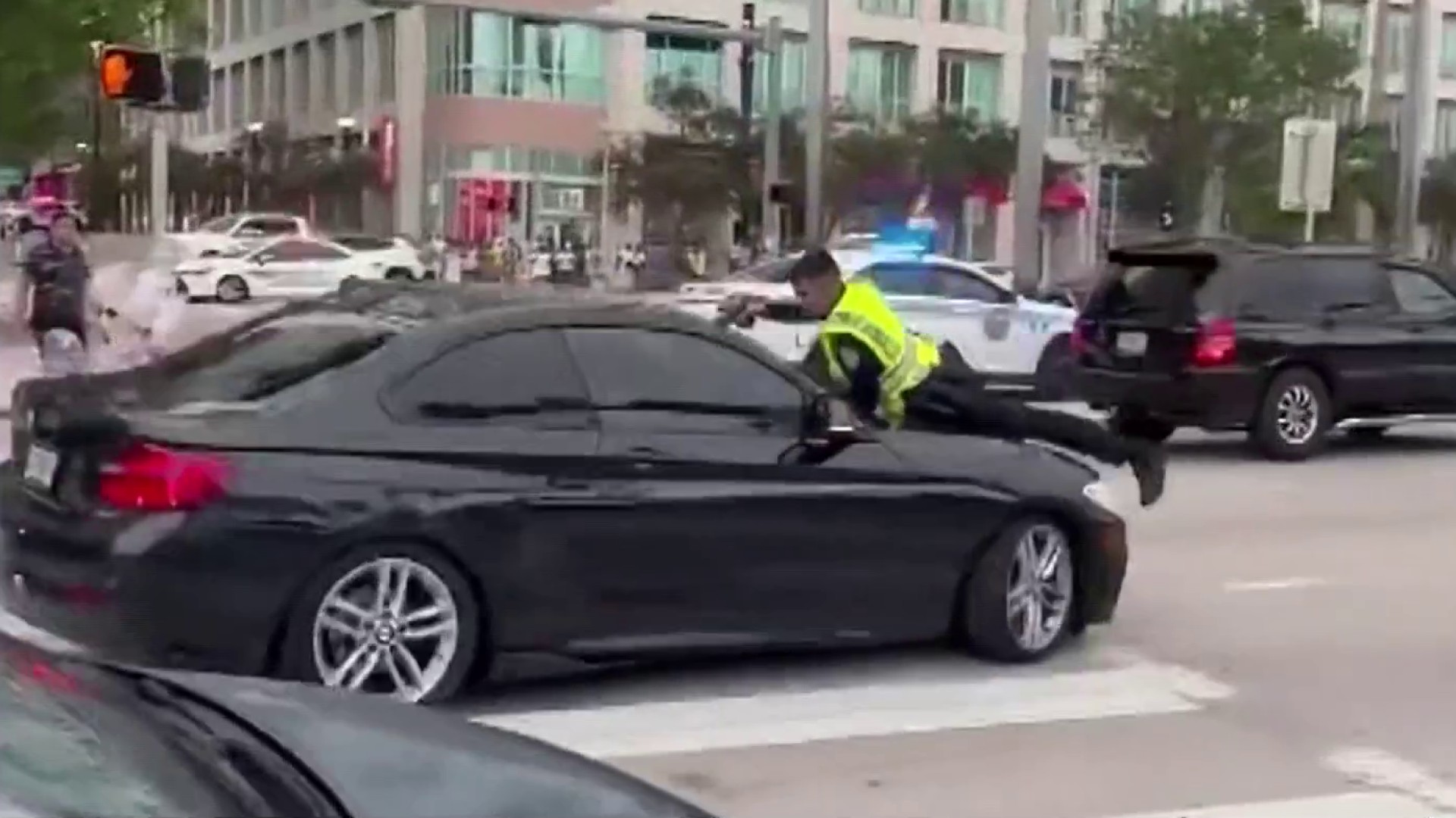Driver shot by Miami cop after allegedly hitting him with car goes ...
