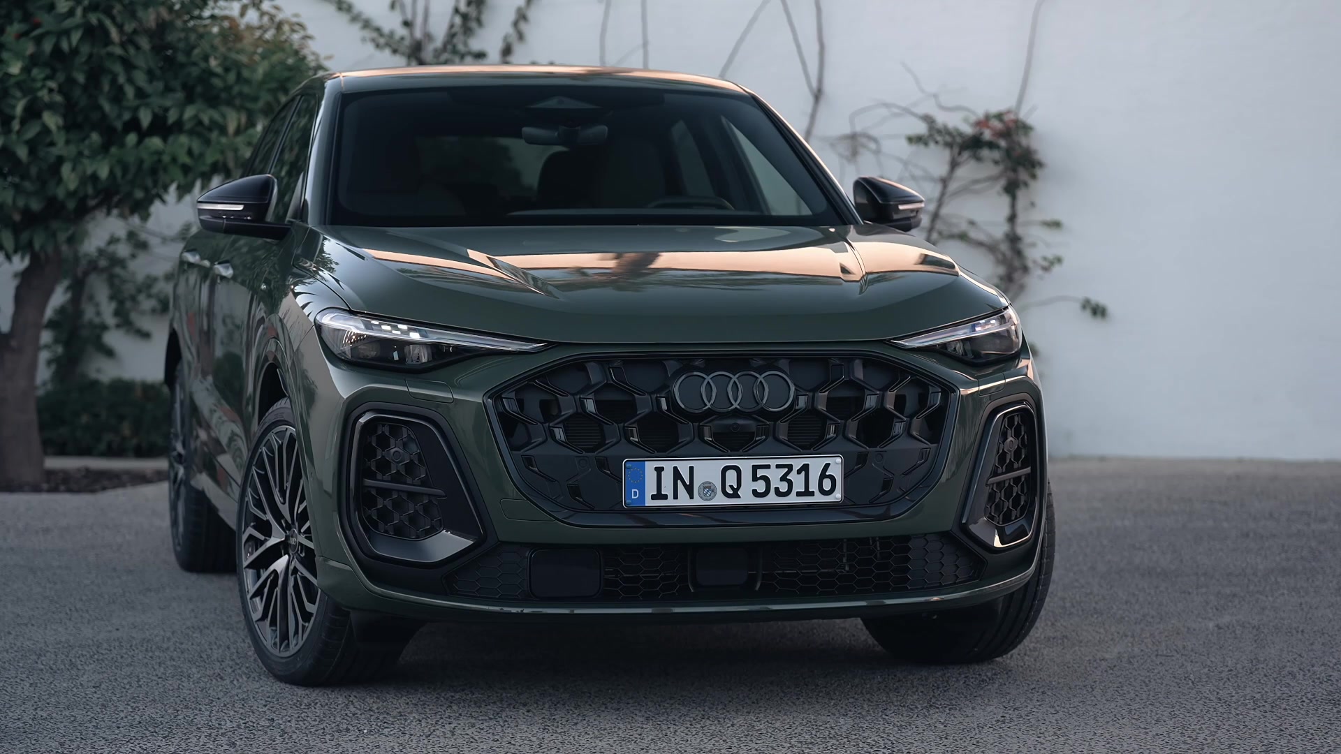 The new Audi Q5 Sportback Design Preview in District green metallic