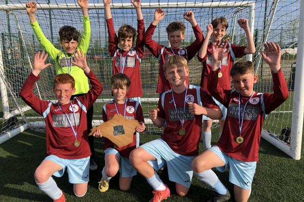 Primary school football finals bring shared trophies and success