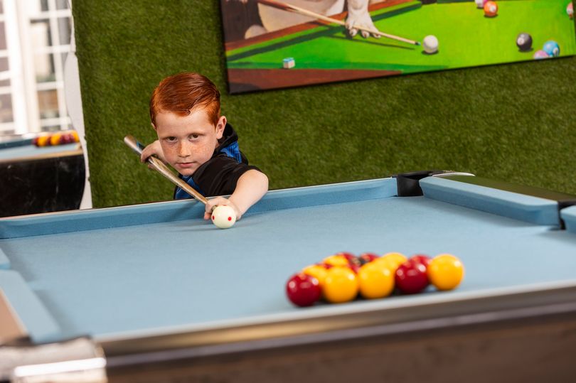 Meet the six-year-old pool wonderkid who is only just taller than the table