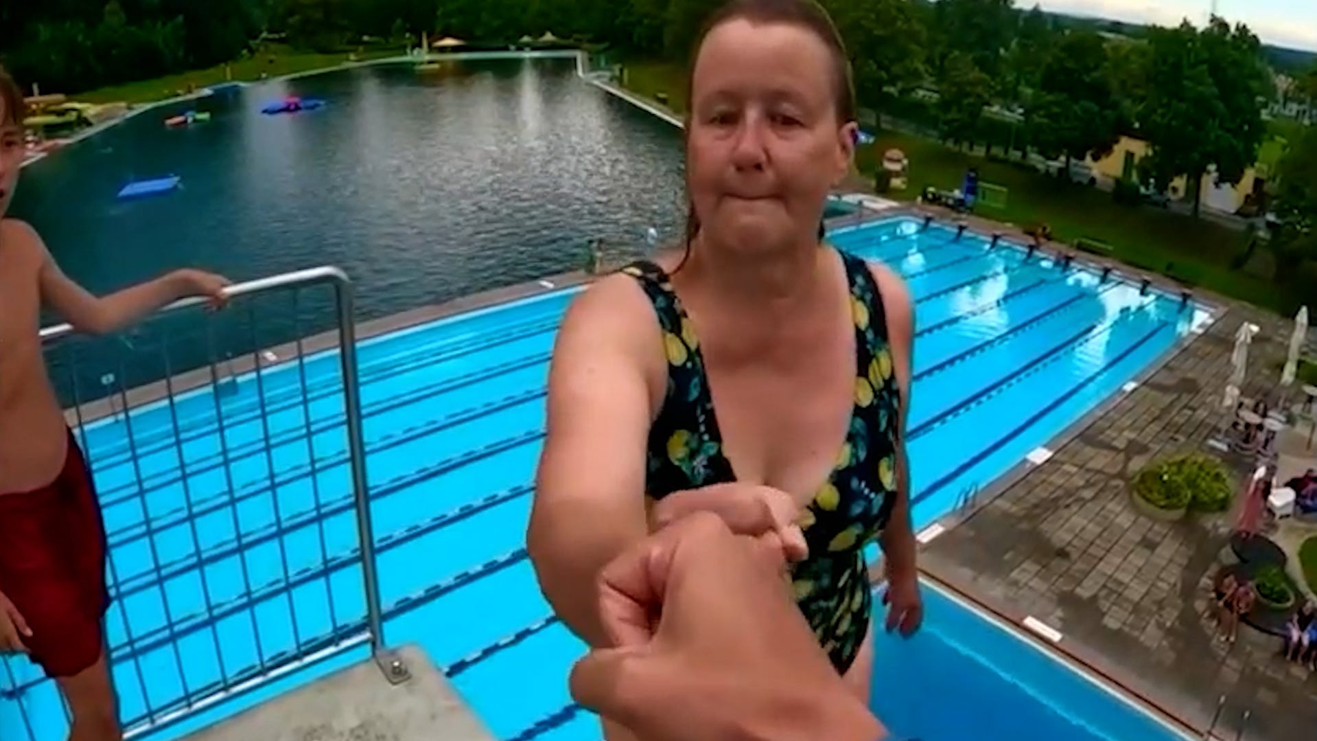 Watch this 62-year-old mom's daring platform high dive