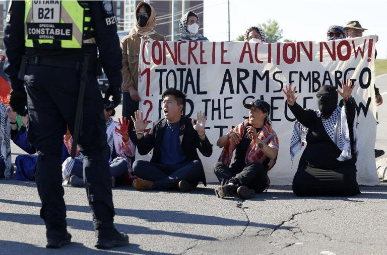 Police arrest 13 protesters opposing CANSEC military trade show