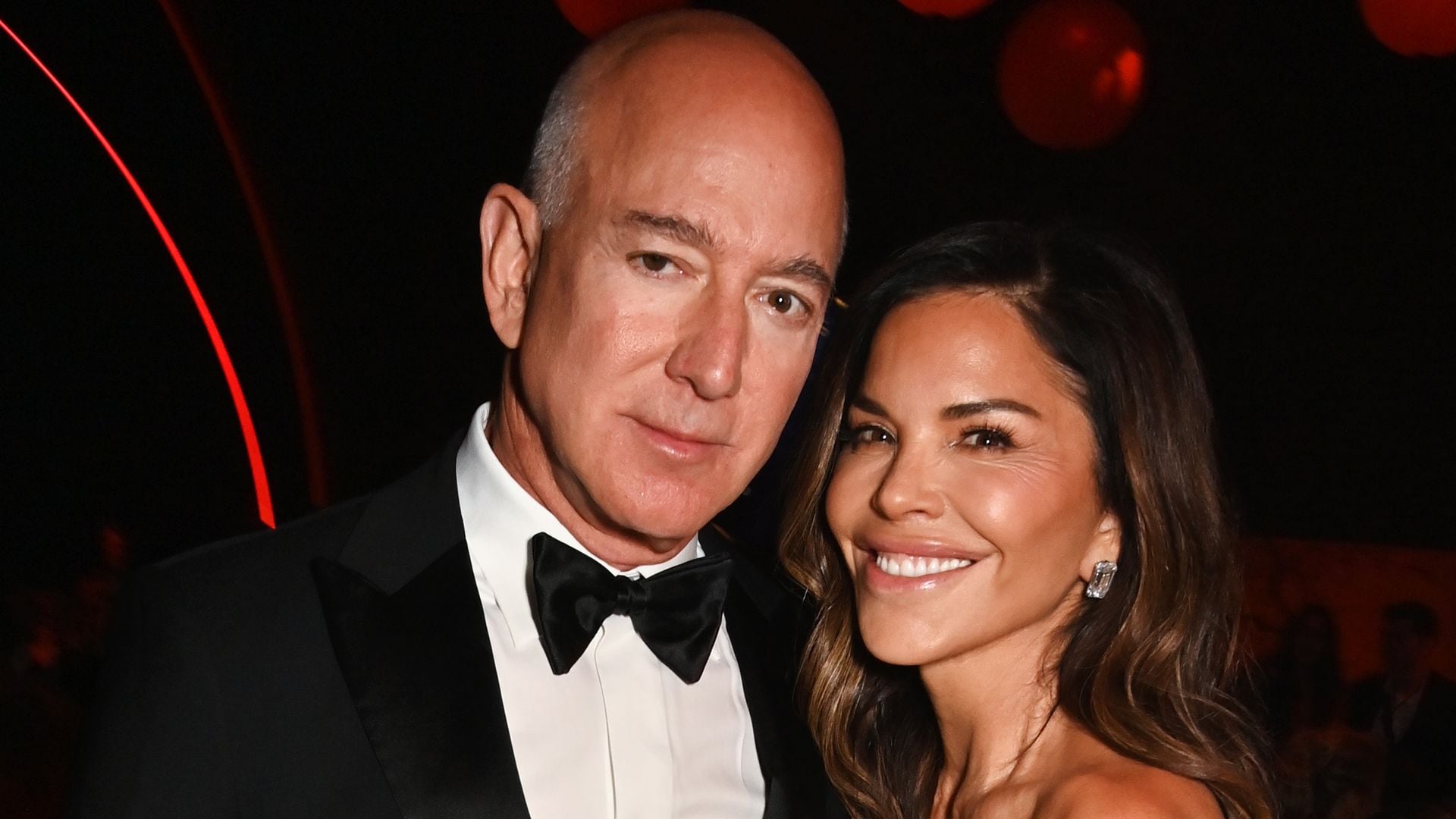Lauren Sanchez & Jeff Bezos rock soft pastels on pre-wedding date night
