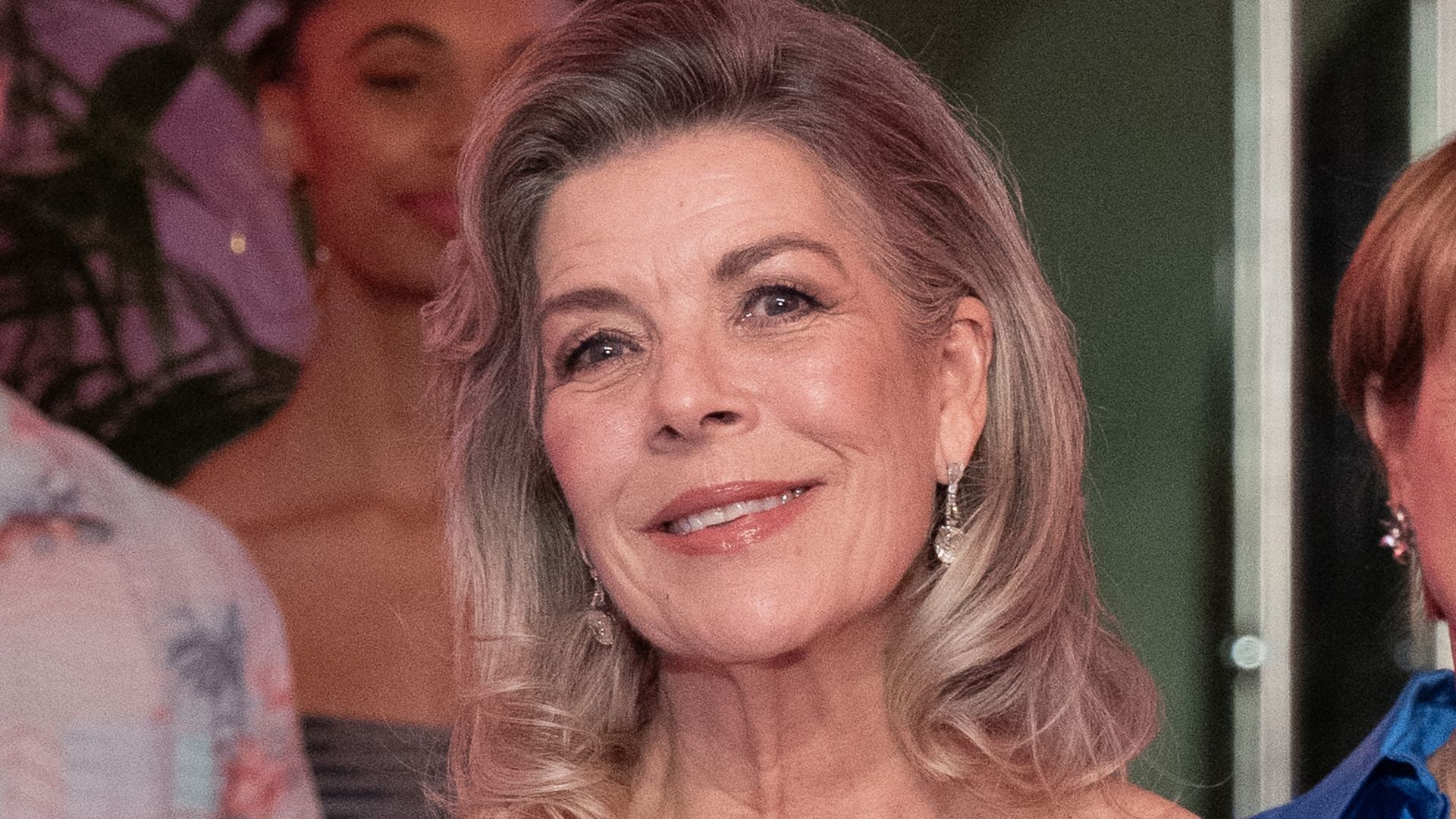 Princess Caroline, 69, shimmers in black velvet maxi dress and Chanel