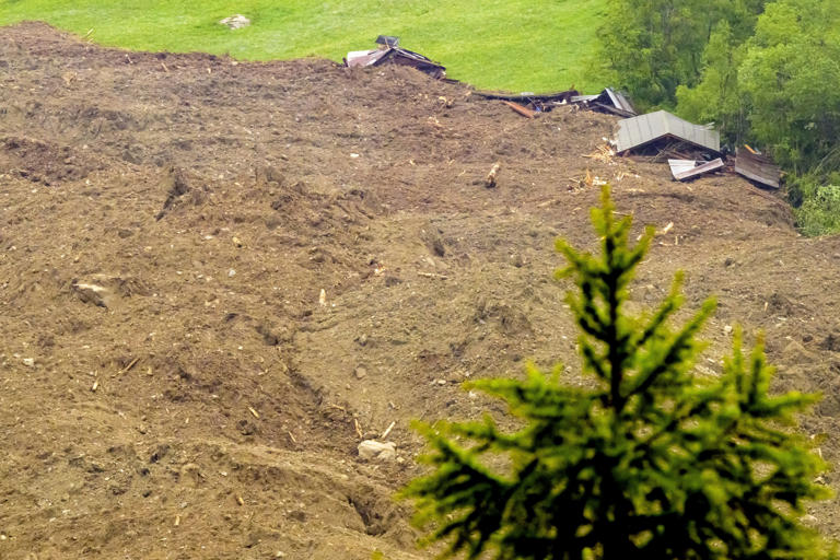 Glacier collapse buries parts of Swiss village under mud and rock