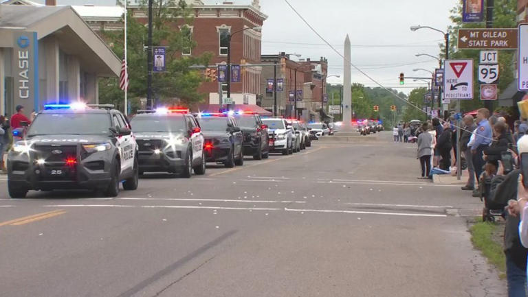 First responders line roads as body of killed deputy returned to Morrow ...