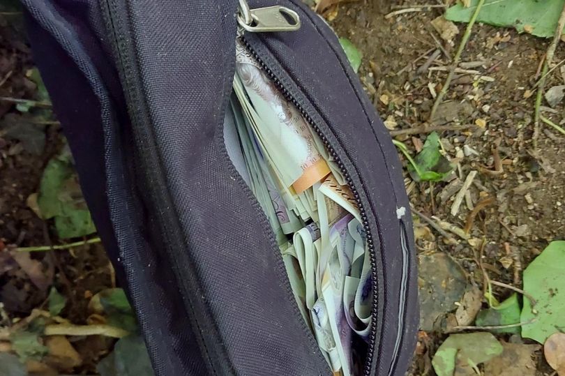 Dog finds bag jammed with thousands of pounds, and that's not all