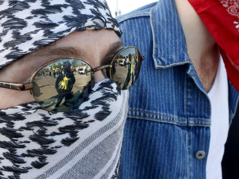 Police arrest 13 protesters opposing CANSEC military trade show