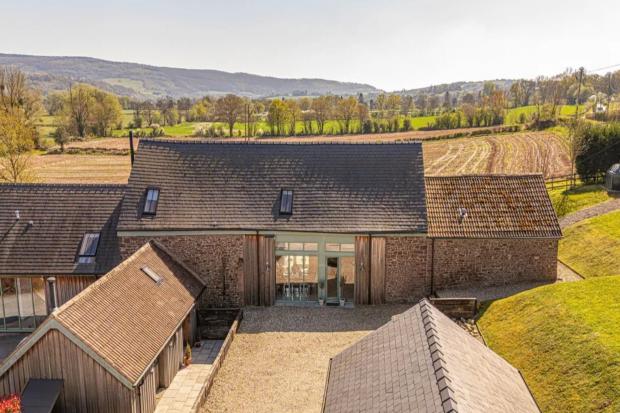 Grade II listed barn conversion with double garage and separate office ...