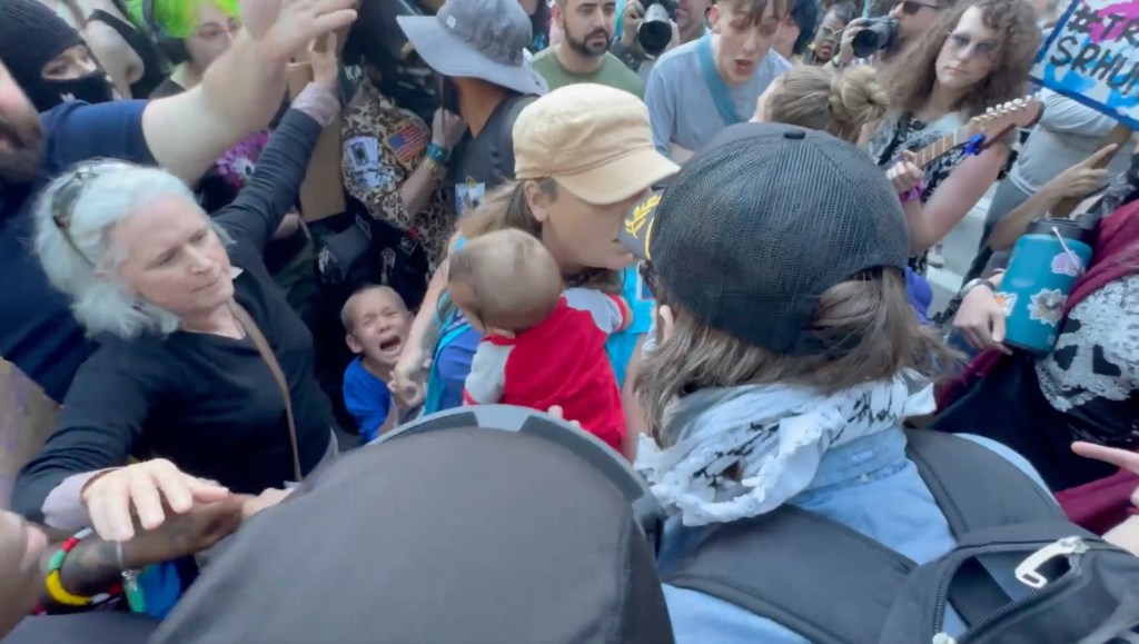 Woke mob accosts mother holding baby at Christian group rally outside ...