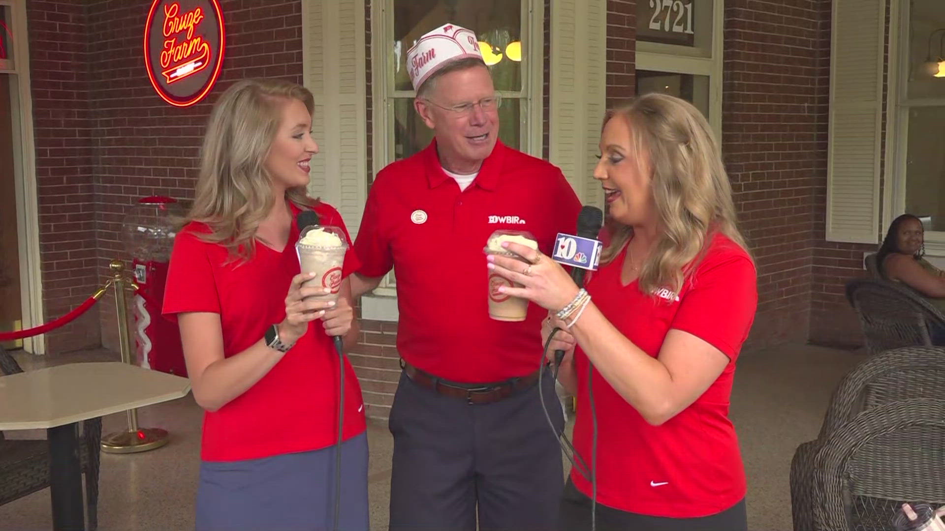 Todd Howell serves up some ice cream to Katie Inman and Brittany Bailey