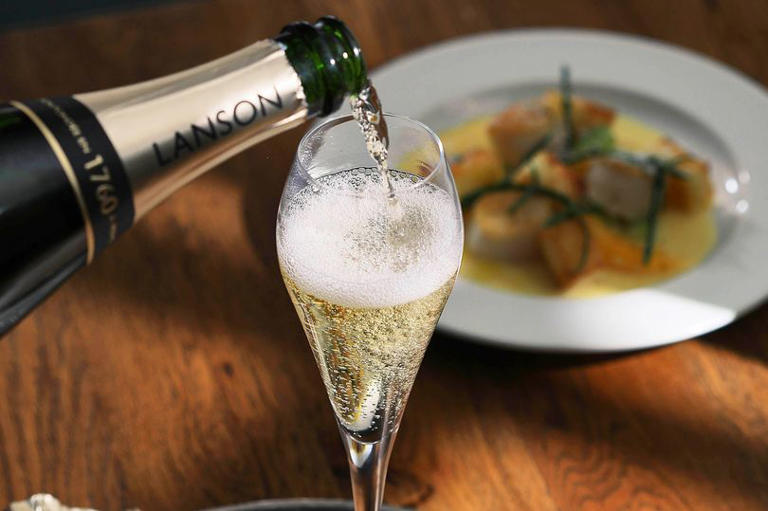 Cote Brasserie serving Champagne by the glass for Apero Hour