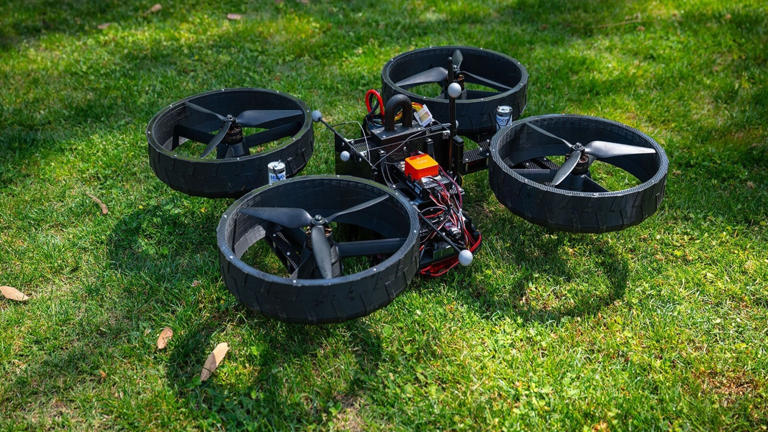 Shape shifter: Real-life transformer robot morphs midair, flies, drives ...