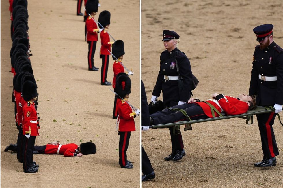 Buckingham Palace guard collapses and has to be carried away on a stretcher