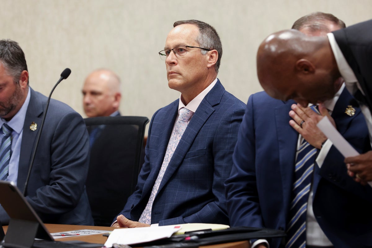 Judge throws out murder charge against Michigan officer who struck a ...