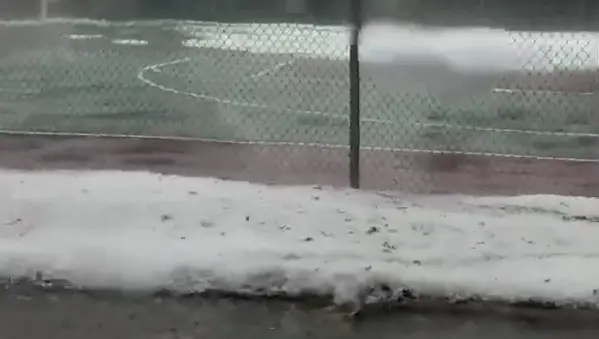 Watch: Texas street turns into a raging river as storm dumps hail ...