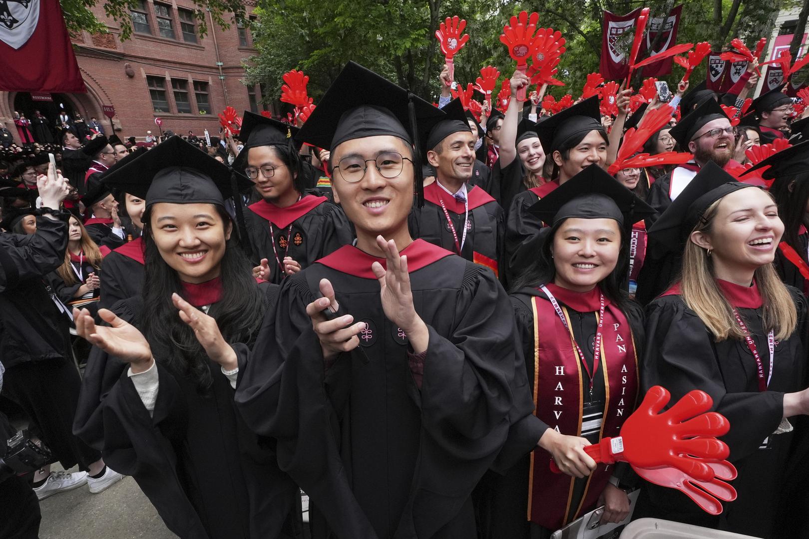 Harvard grads cheer commencement speakers who urge the school to stand ...