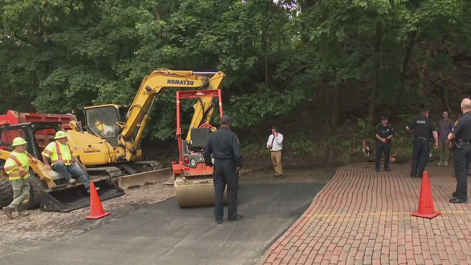 Pennsylvania state representative stands in front of construction crews ...