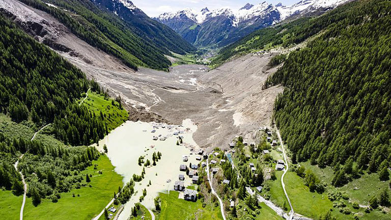 Falling debris forces suspension of search for missing man after ...