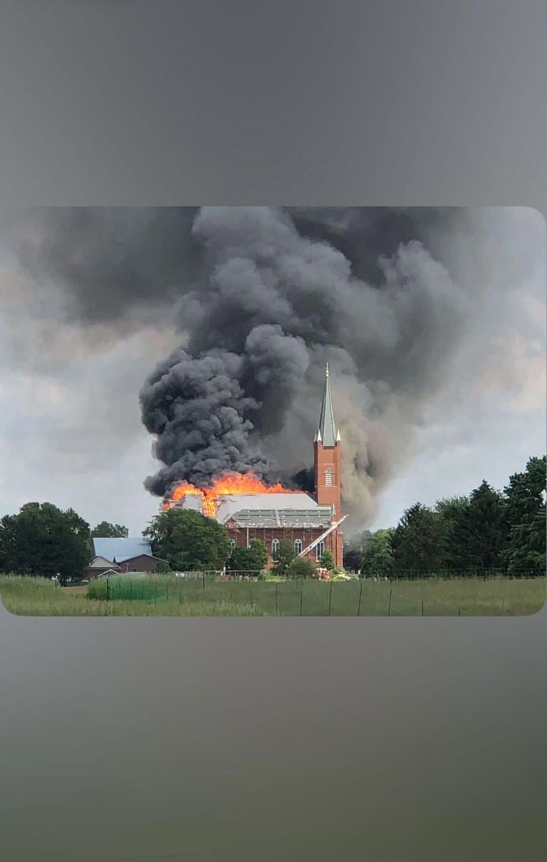 Steeple collapses after fire rips through historic Catholic church