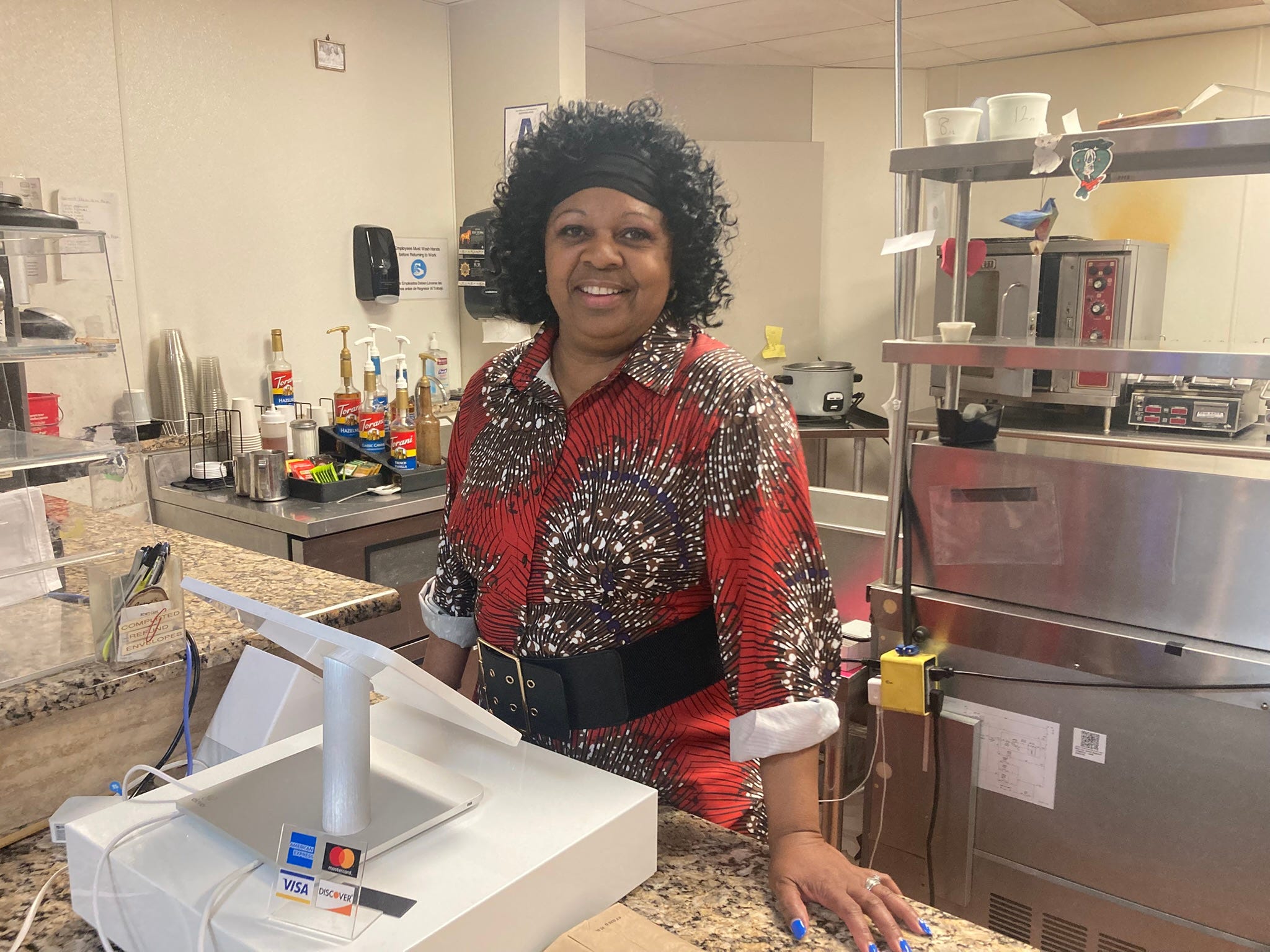 She used to work at the cafe below Milwaukee's City Hall. Now she owns it.