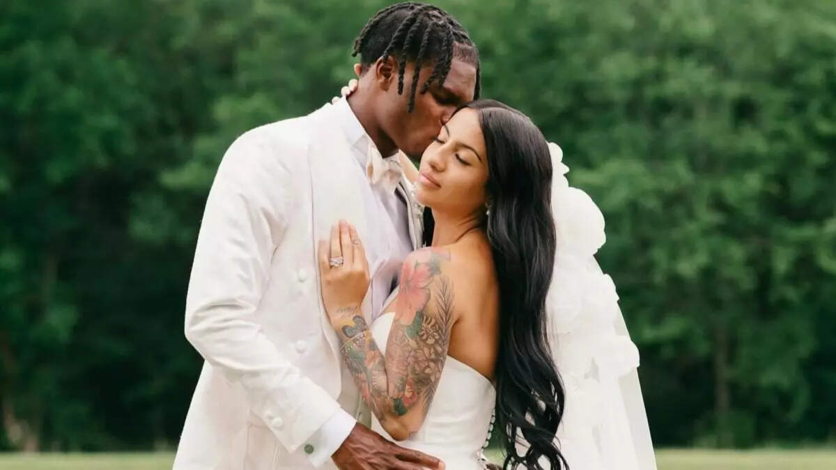 Travis Hunter’s wife Leanna Lenee’s wedding dress leaves fans in awe with one stunning detail ...