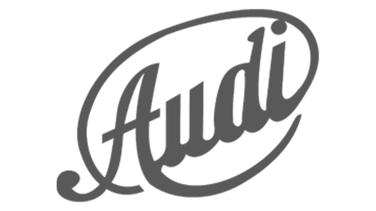 The history of the Audi logo: from script font to mergers and rings