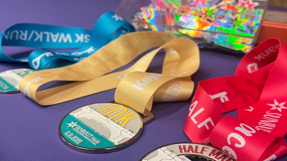 Runners, walkers pick up packets for Sunburst Race