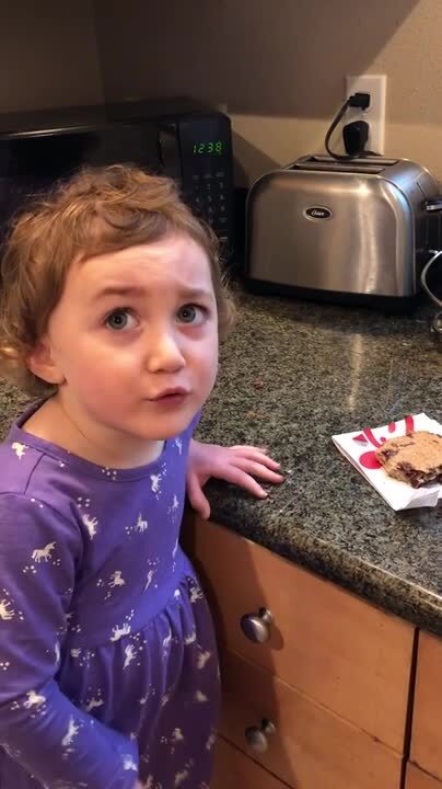 Little Girl Gets Caught While Sneaking Cookie Inside Her Mouth
