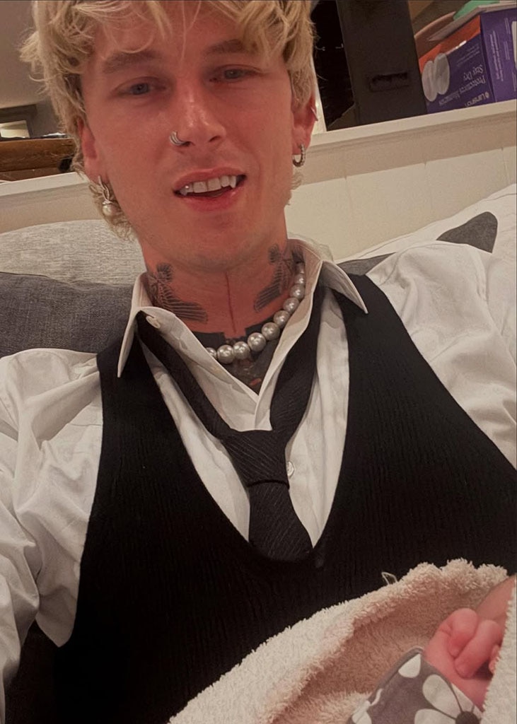 Machine Gun Kelly’s New Photo With Baby Girl Deserves All the Flowers