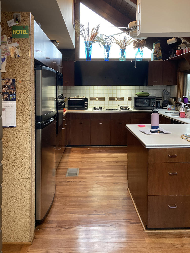 A “Command Center” Cabinet Blends Right Into This Colorful Kitchen ...