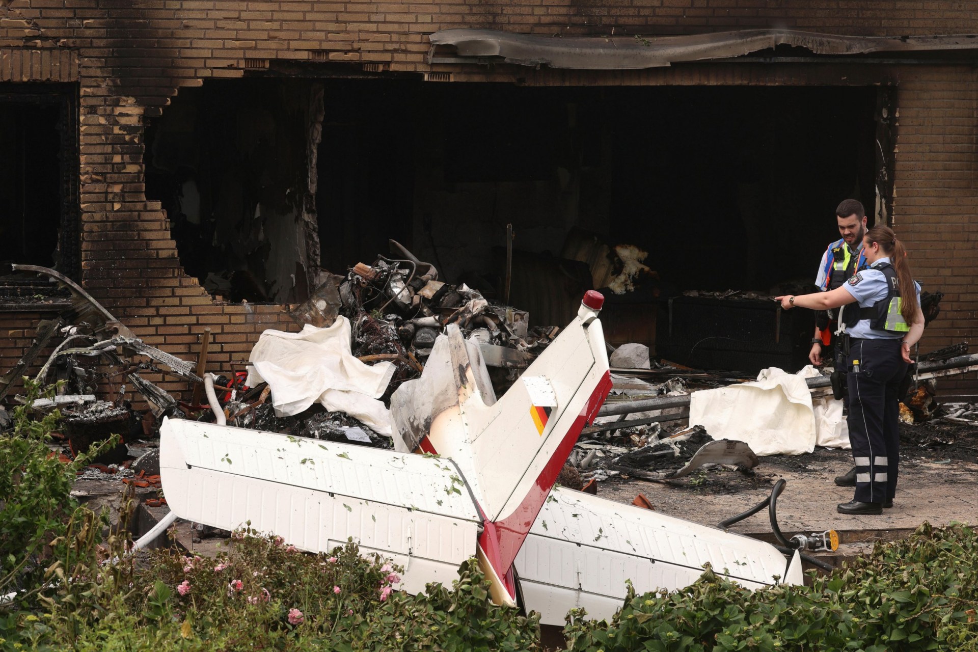 Two People Killed After Plane Crashes Into House And Bursts Into Flames