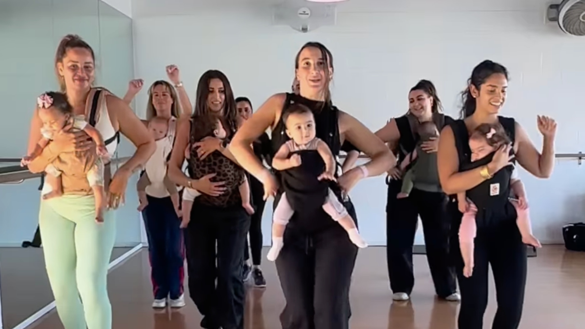 These mothers dance with their babies in slings, and it's magical!