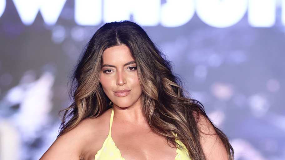 Denise Bidot Commands Attention in Stunning SI Swimsuit Runway Debut