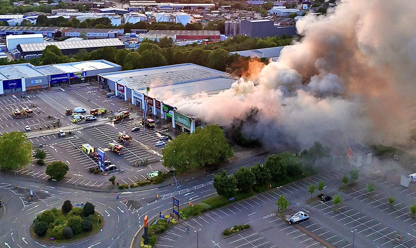 Three people arrested after fire rips through Pets At Home and Dunelm