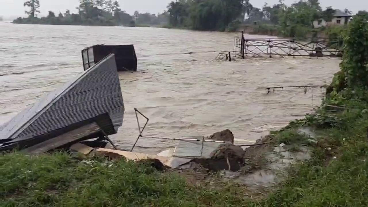 Swollen river drags water tower into surging torrents in eastern India