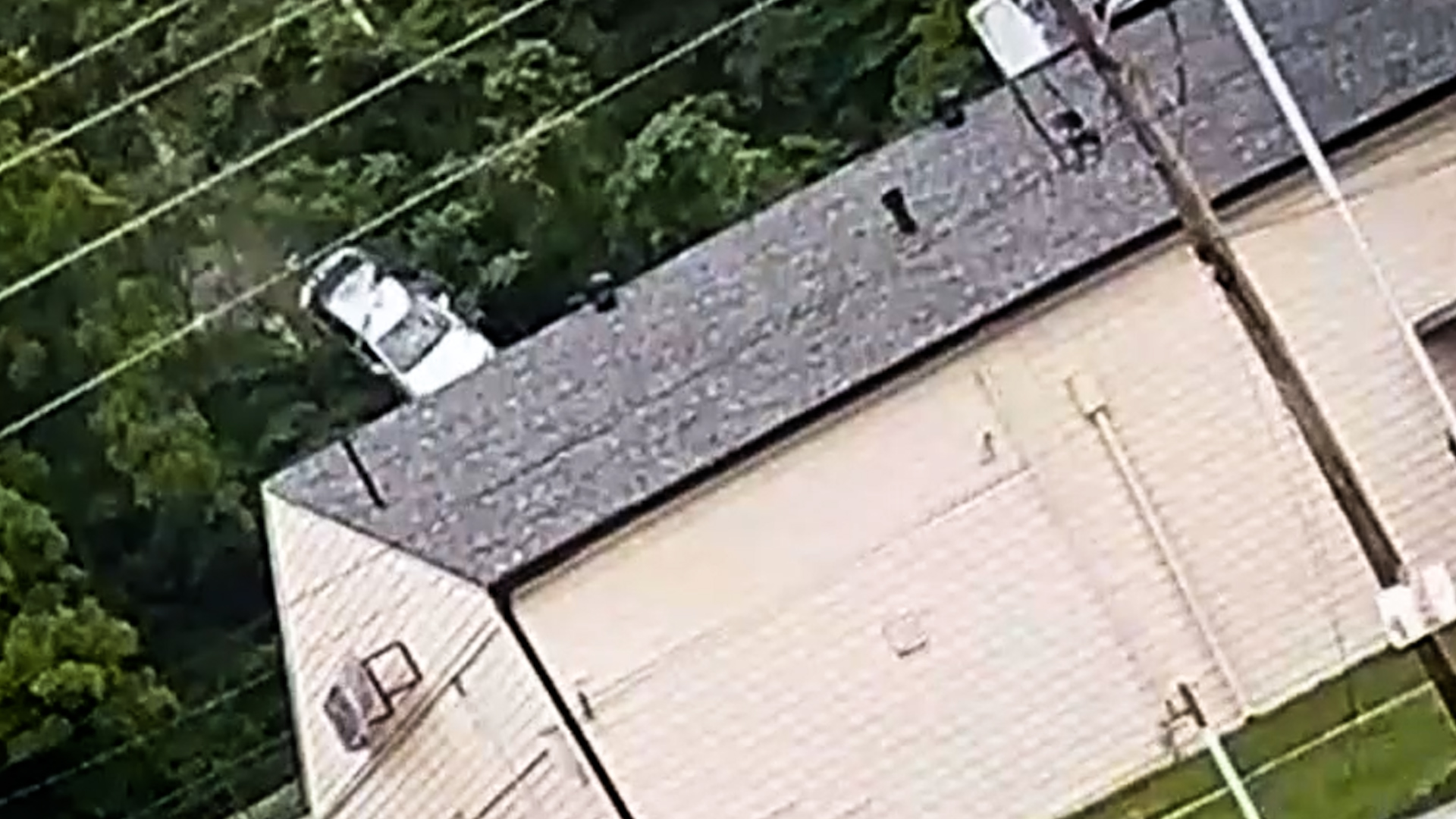 Car flies off freeway crashing through town hall roof