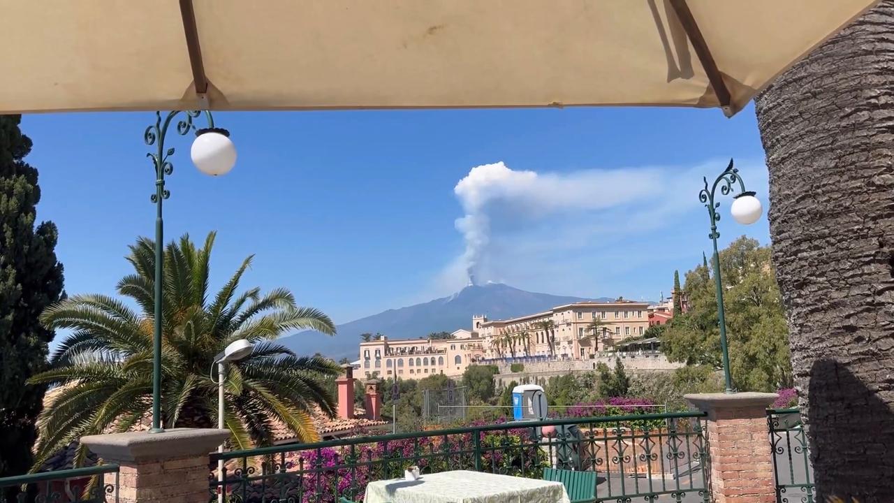 Mount Etna volcano erupts as shocked tourists watch from resort