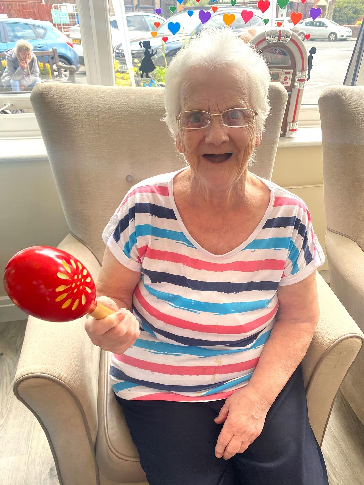 Care home's housekeeping head helps keep residents active