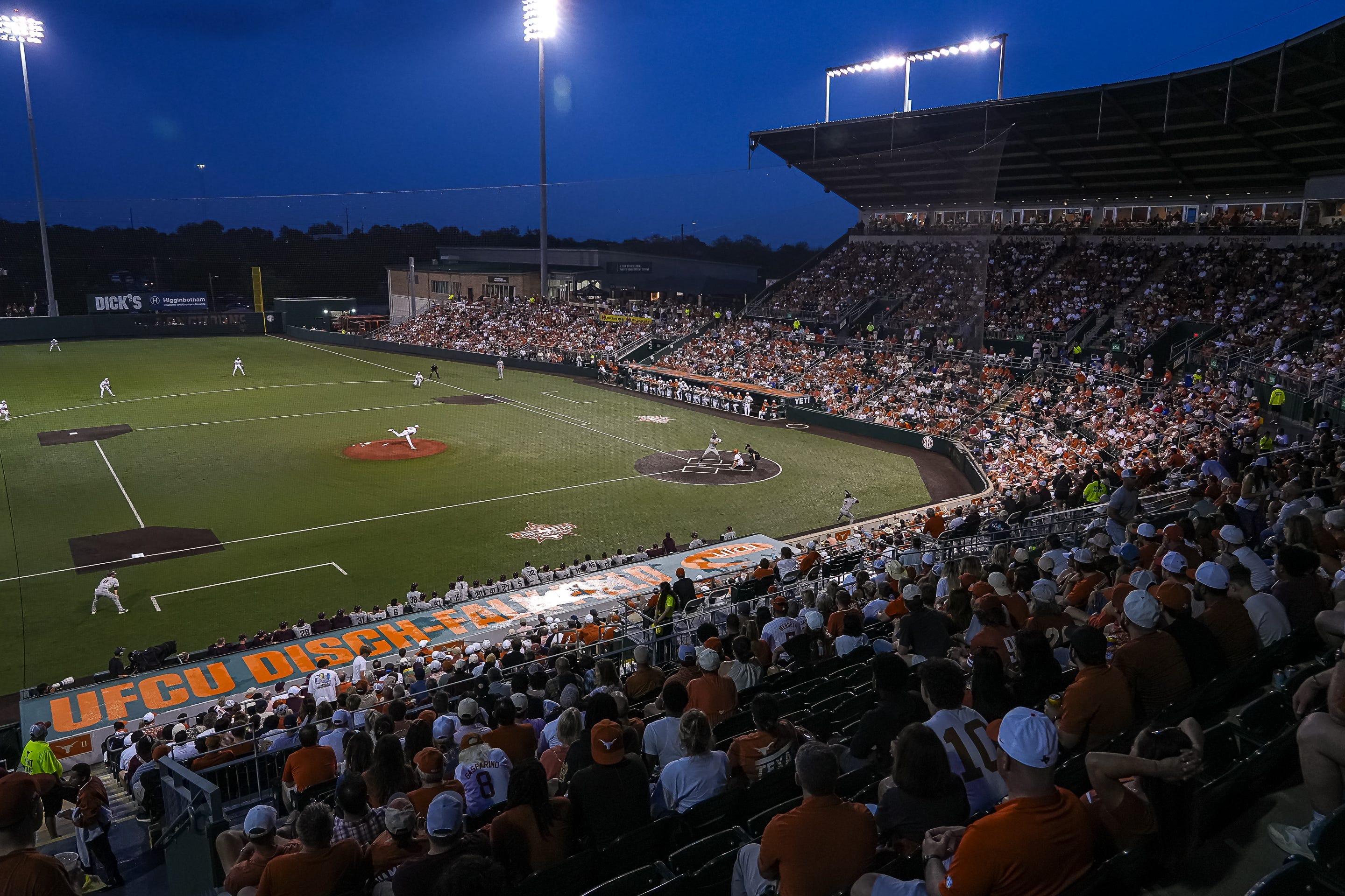 College baseball fans react to the Texas Longhorns getting bounced out ...
