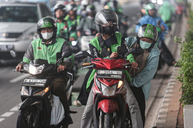 Ekonom soal Wacana Merger Grab dan Gojek: Risiko Monopoli dan Tarif Ojol