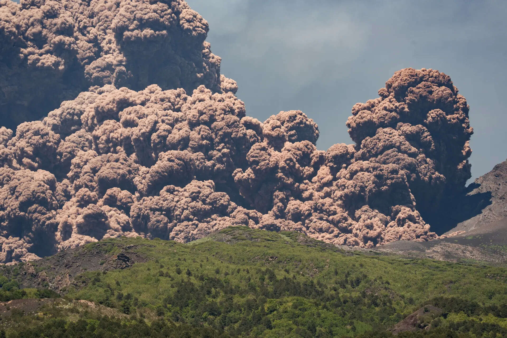 Mount Etna erupts with a massive plume of ash, gas, sends tourists ...
