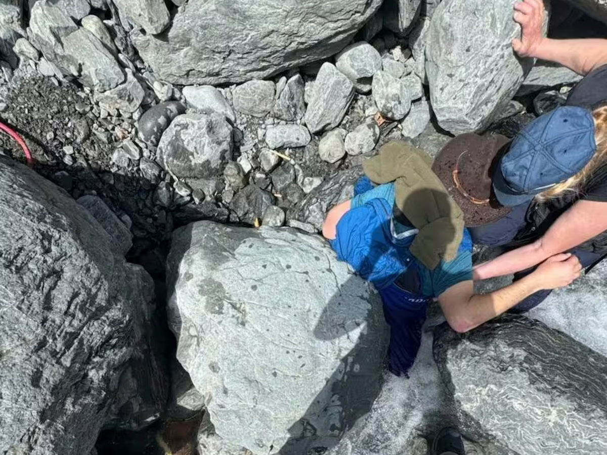 Man trapped under 317kg rock in stream for three hours survives