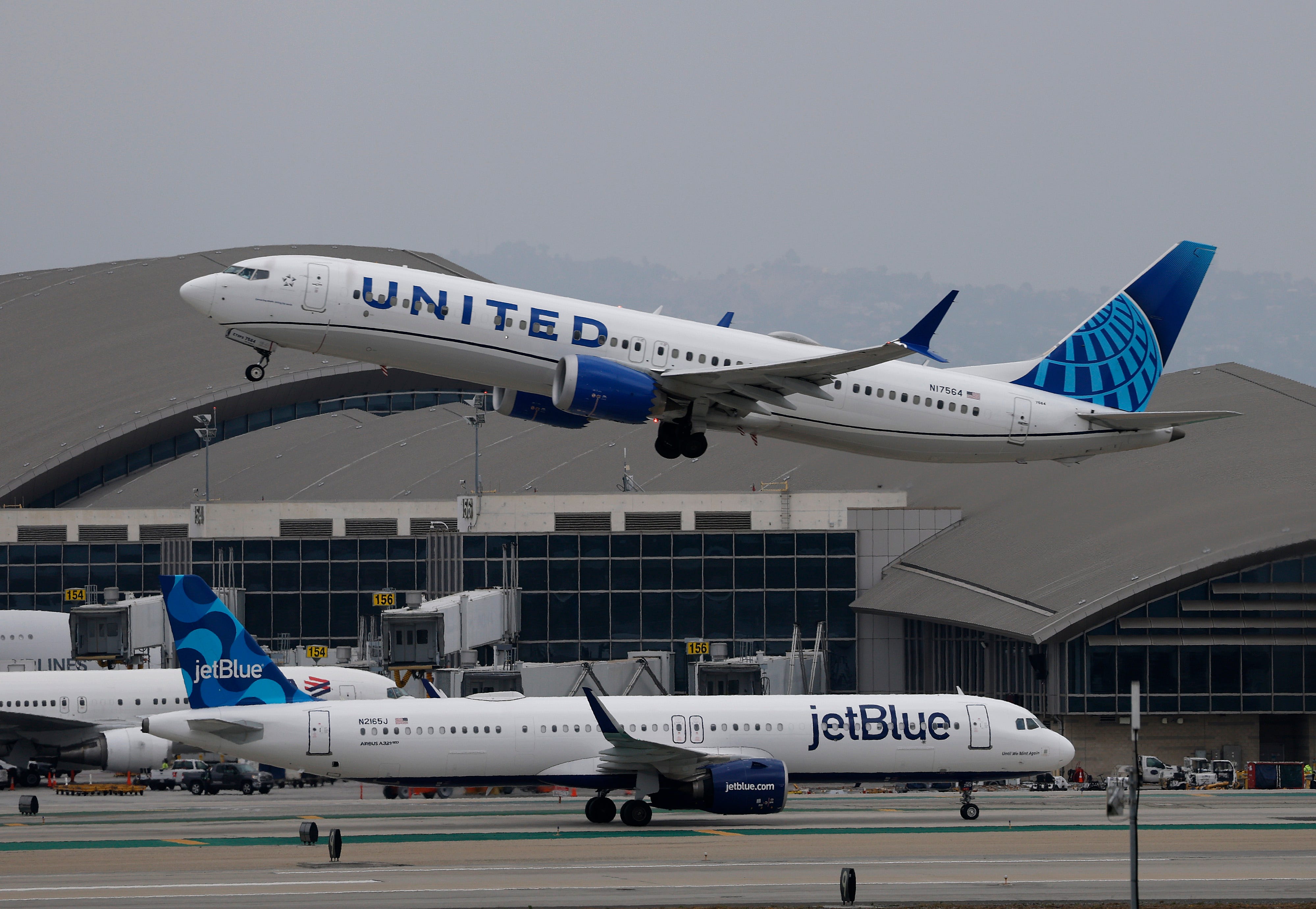 Frequent flyer win? United and JetBlue plan to share miles and status ...