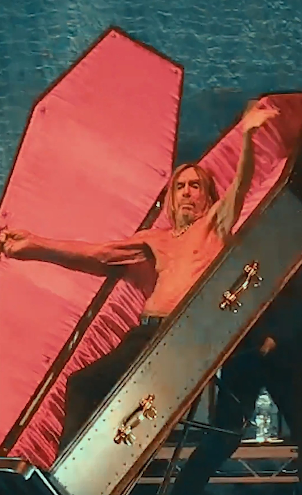 Shirtless Iggy Pop, 78, wheeled off the stage in a coffin during ...
