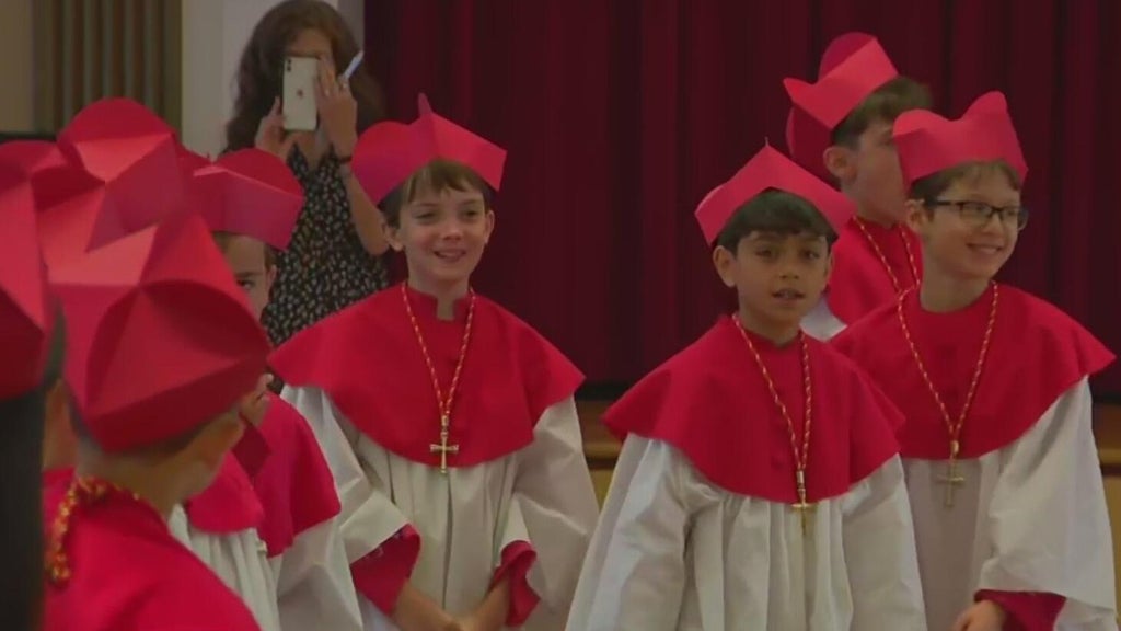 Cardinal Blase Cupich visits Chicago school known for holding mini conclave